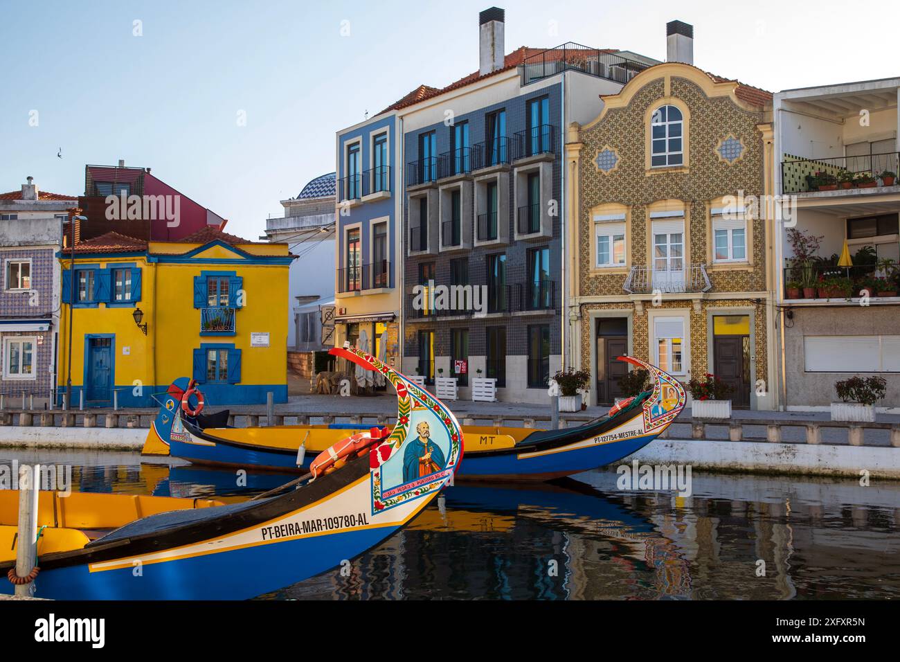 Aveiro, Portugal - 26th June 2024; Colorful Art Nouveau buildings and boats In Aveiro, Centro ...