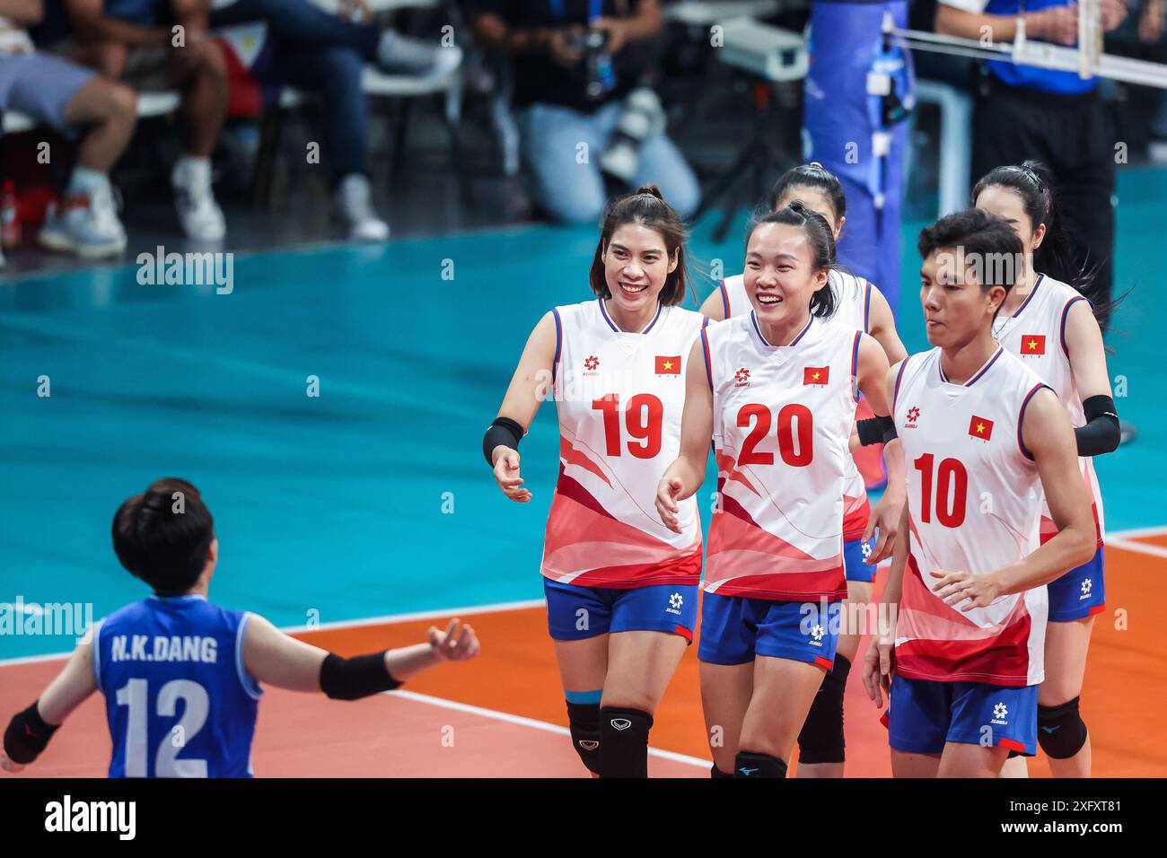 Manila, Philippines. 5th July, 2024. Players of Vietnam celebrate after scoring a point during ...