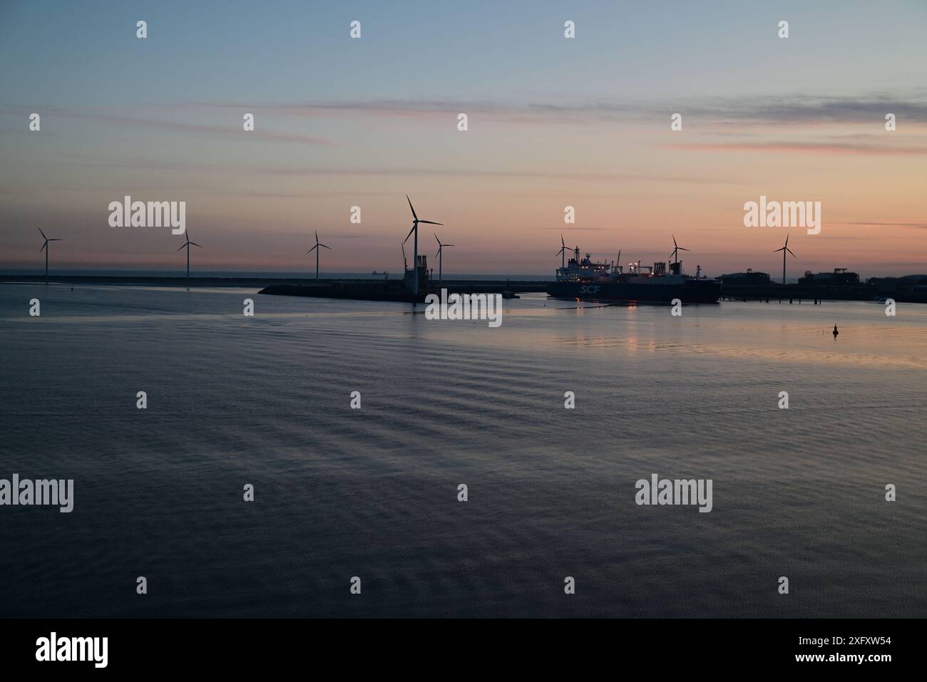 Sunrise over the North Sea port of Zeebrugge Stock Photo - Alamy