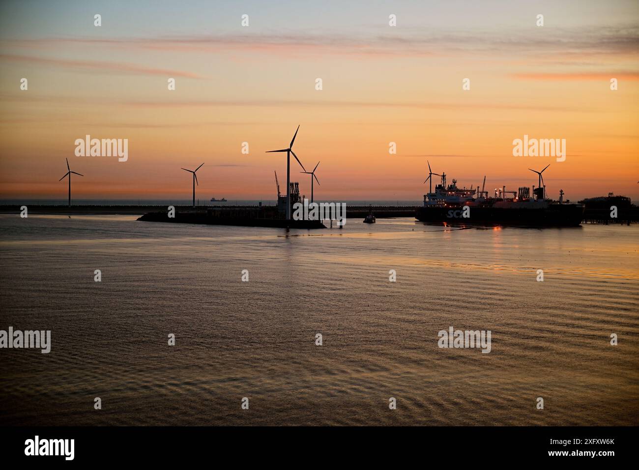 Sunrise over the North Sea port of Zeebrugge Stock Photo - Alamy