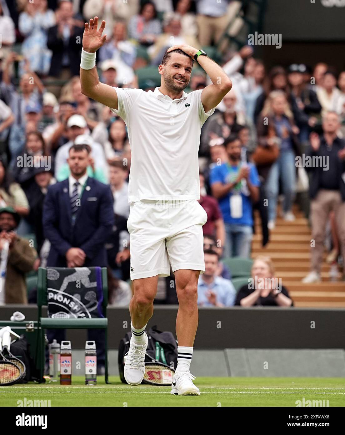 Grigor Dimitrov celebrates victory over Gael Monfils on day five of the ...