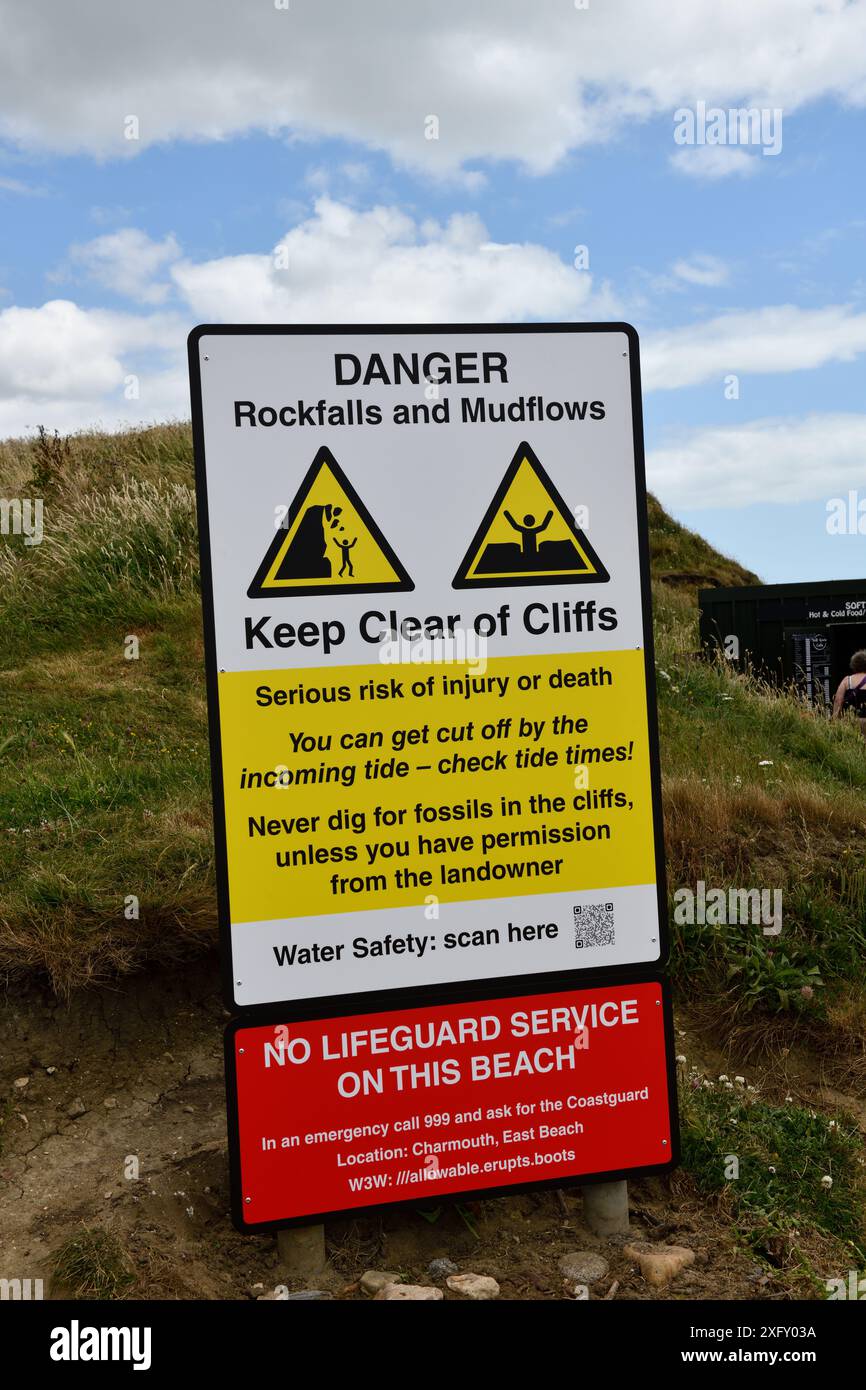 Danger Sign on Charmouth Beach Dorset England uk in the Summer July ...