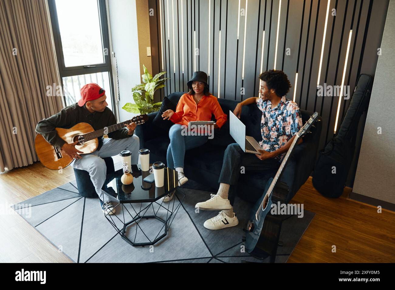 Band Working In Recording Studio Stock Photo - Alamy
