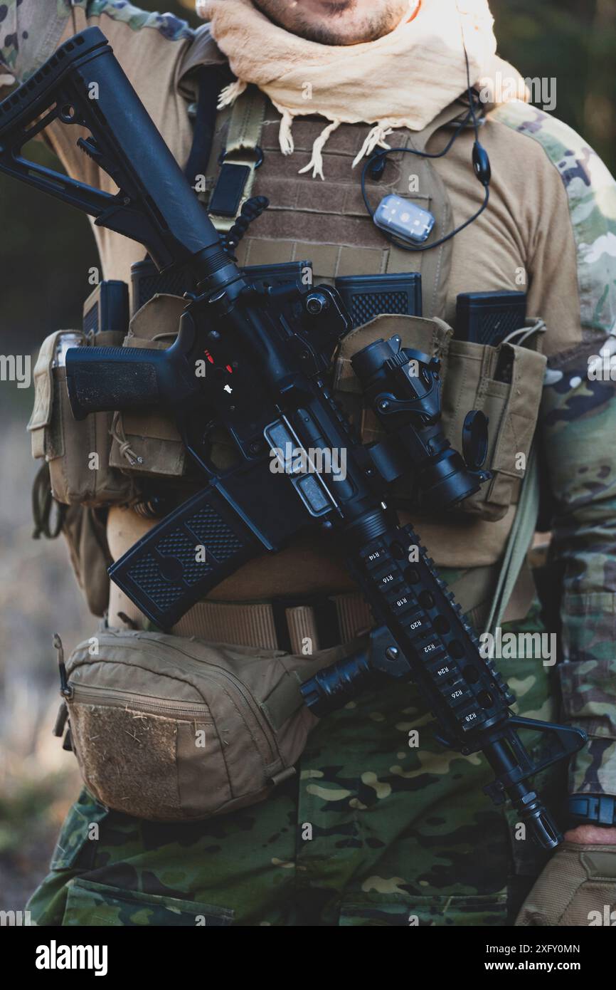 Camouflage uniform rifle military hi-res stock photography and images ...