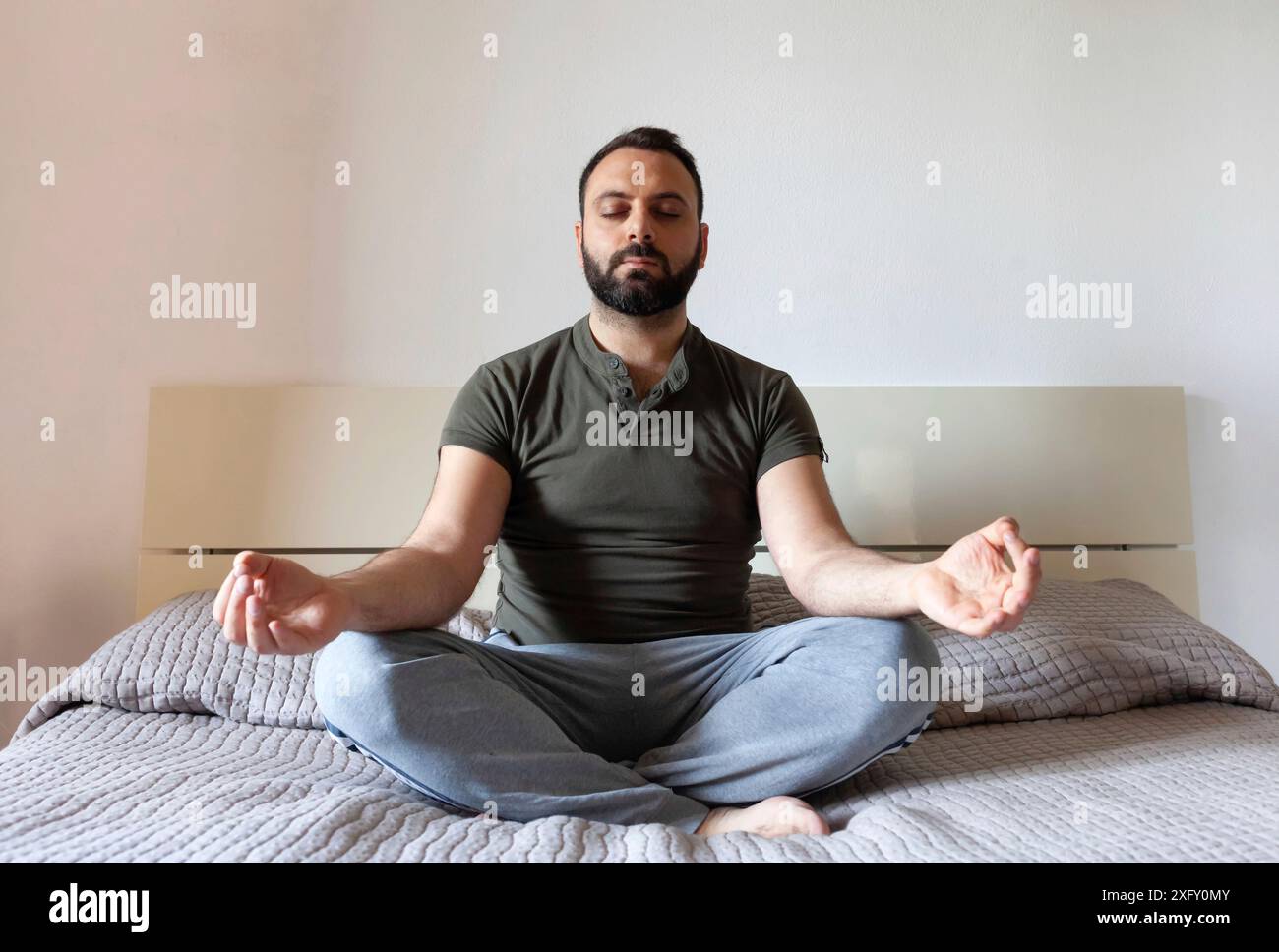 Meditating guy hi-res stock photography and images - Alamy