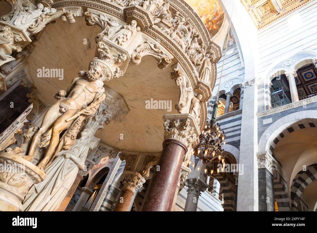 Pisa, Italy - 29 June 2023. Cathedral interior. The pulpit, Medieval ...