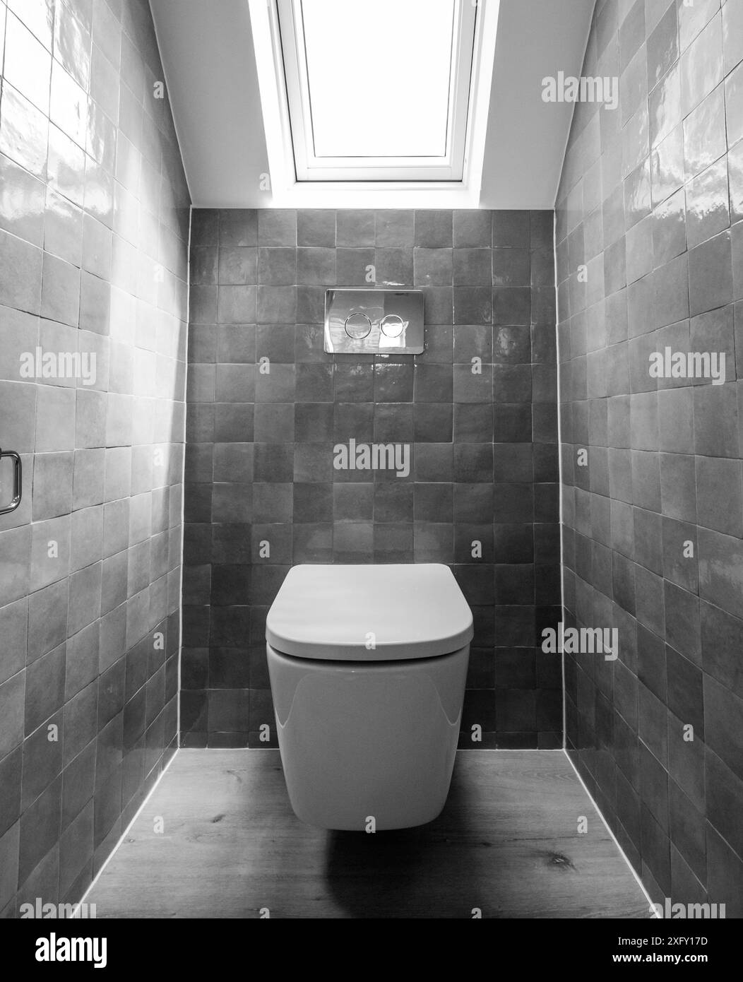 Small toilet in loft conversion making clever use of eaves in the attic ...