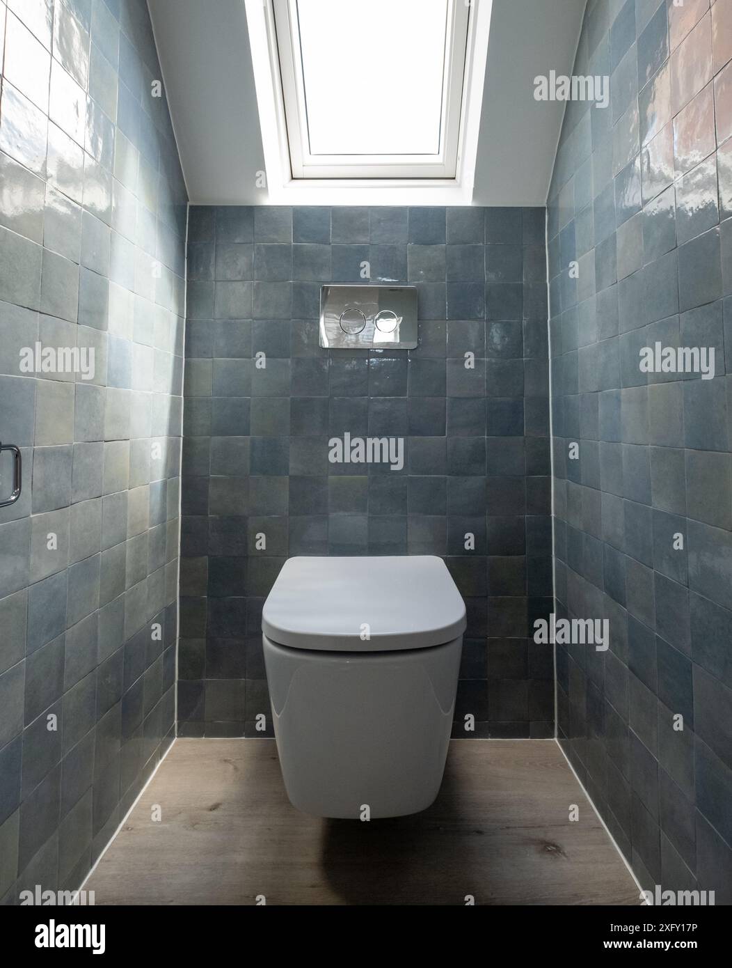 Small toilet in loft conversion making clever use of eaves in the attic ...