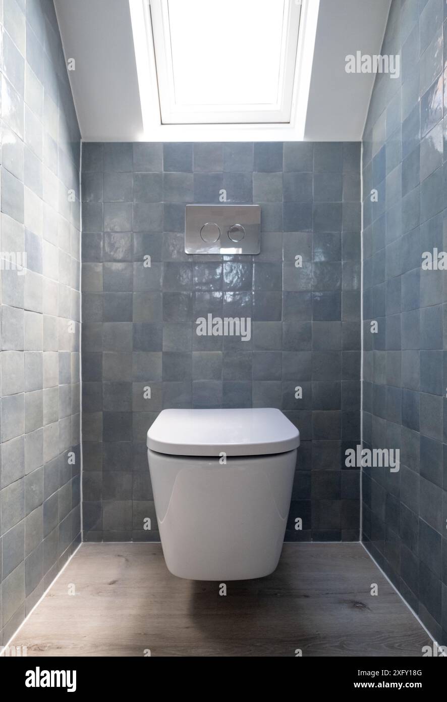 Small toilet in loft conversion making clever use of eaves in the attic ...