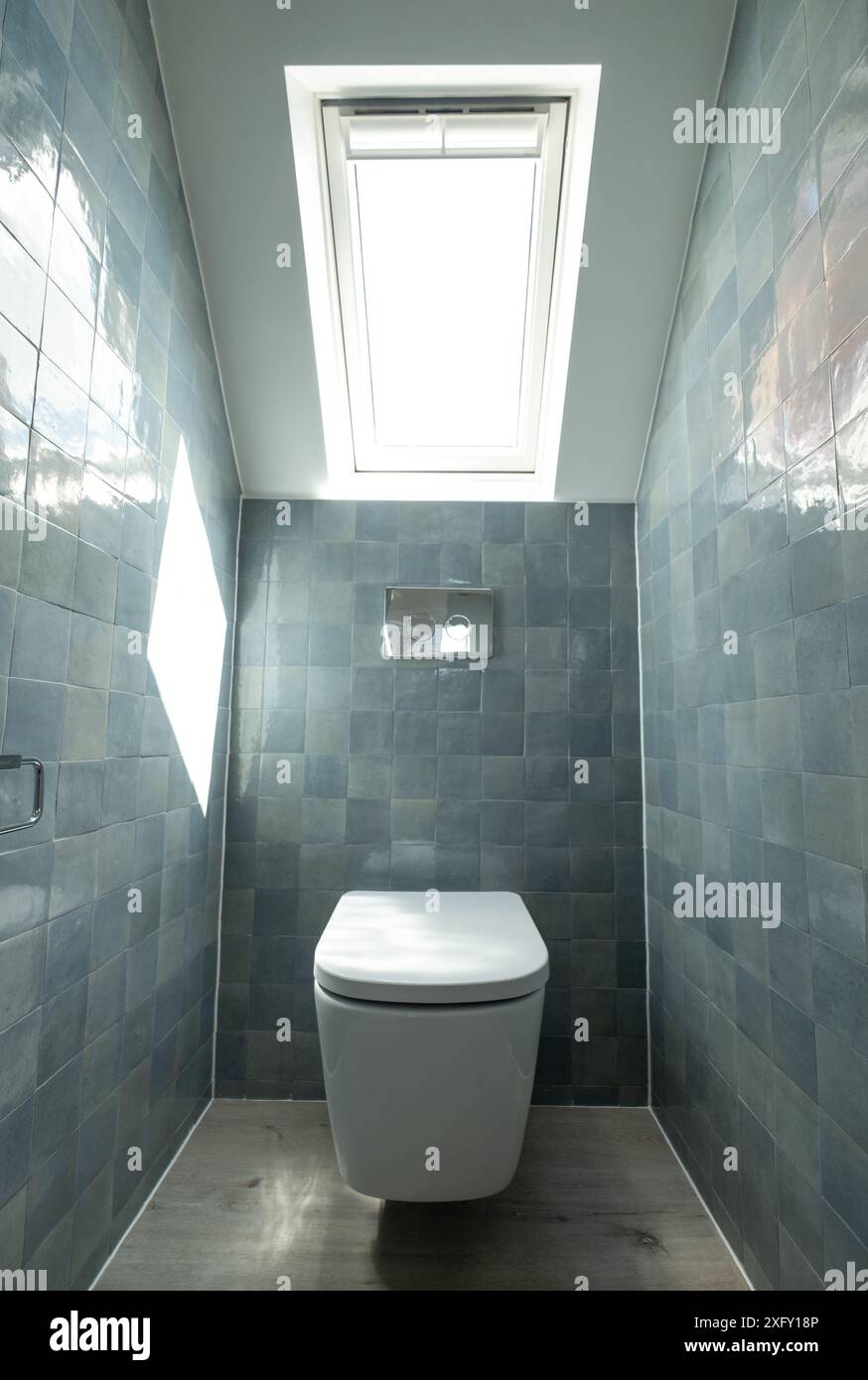 Small toilet in loft conversion making clever use of eaves in the attic ...