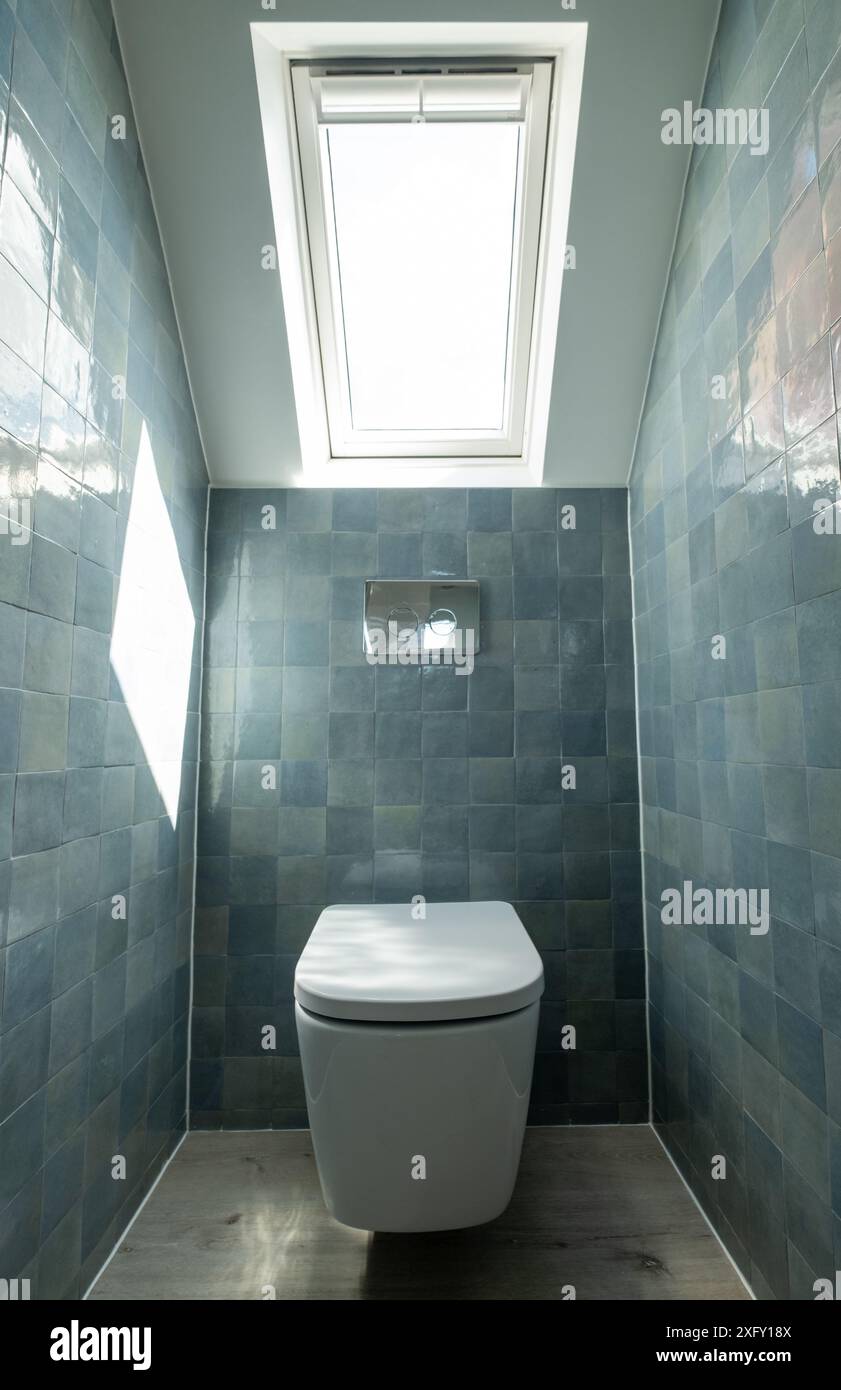 Small toilet in loft conversion making clever use of eaves in the attic ...