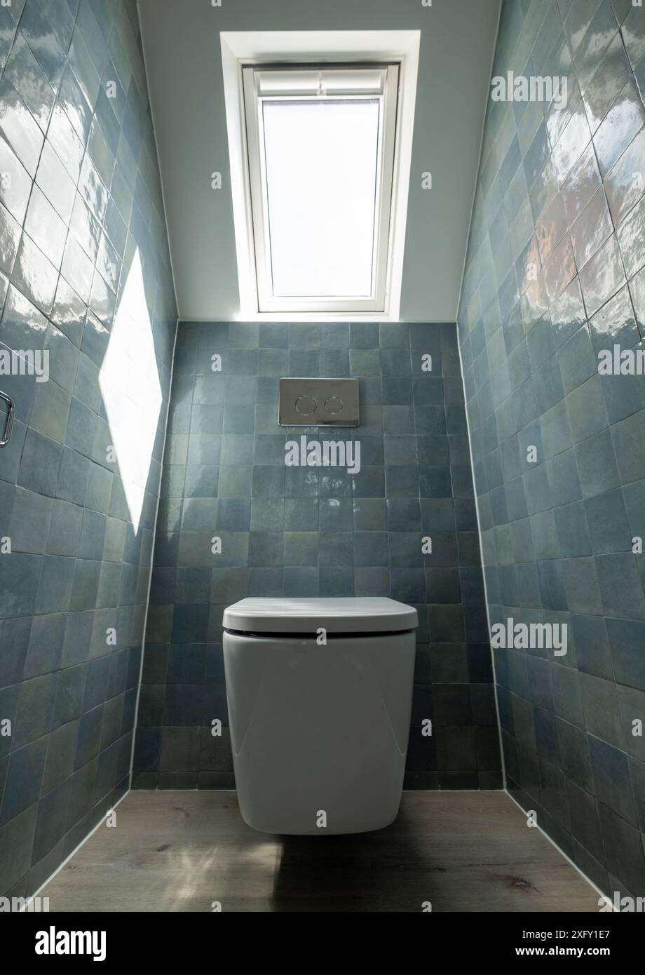 Small toilet in loft conversion making clever use of eaves in the attic ...