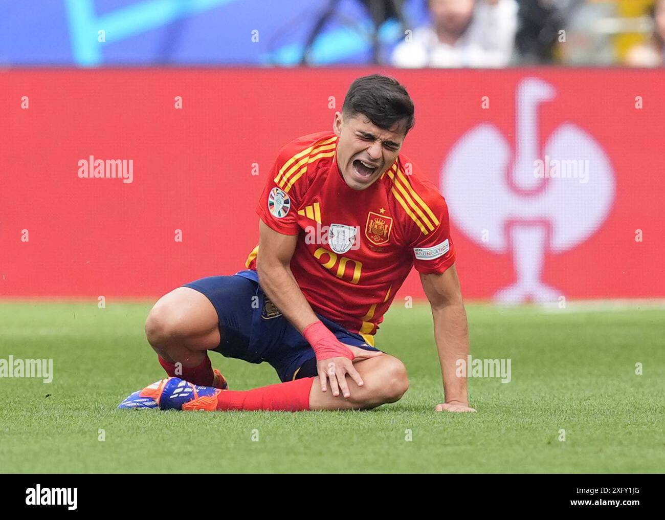Spain's Pedri looks in pain after an injury before leaving the game ...