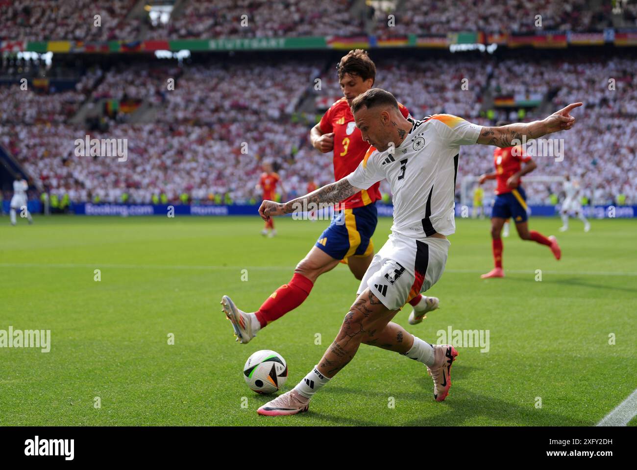 Germany's David Raum in action against Spain’s Robin Le Normand during ...