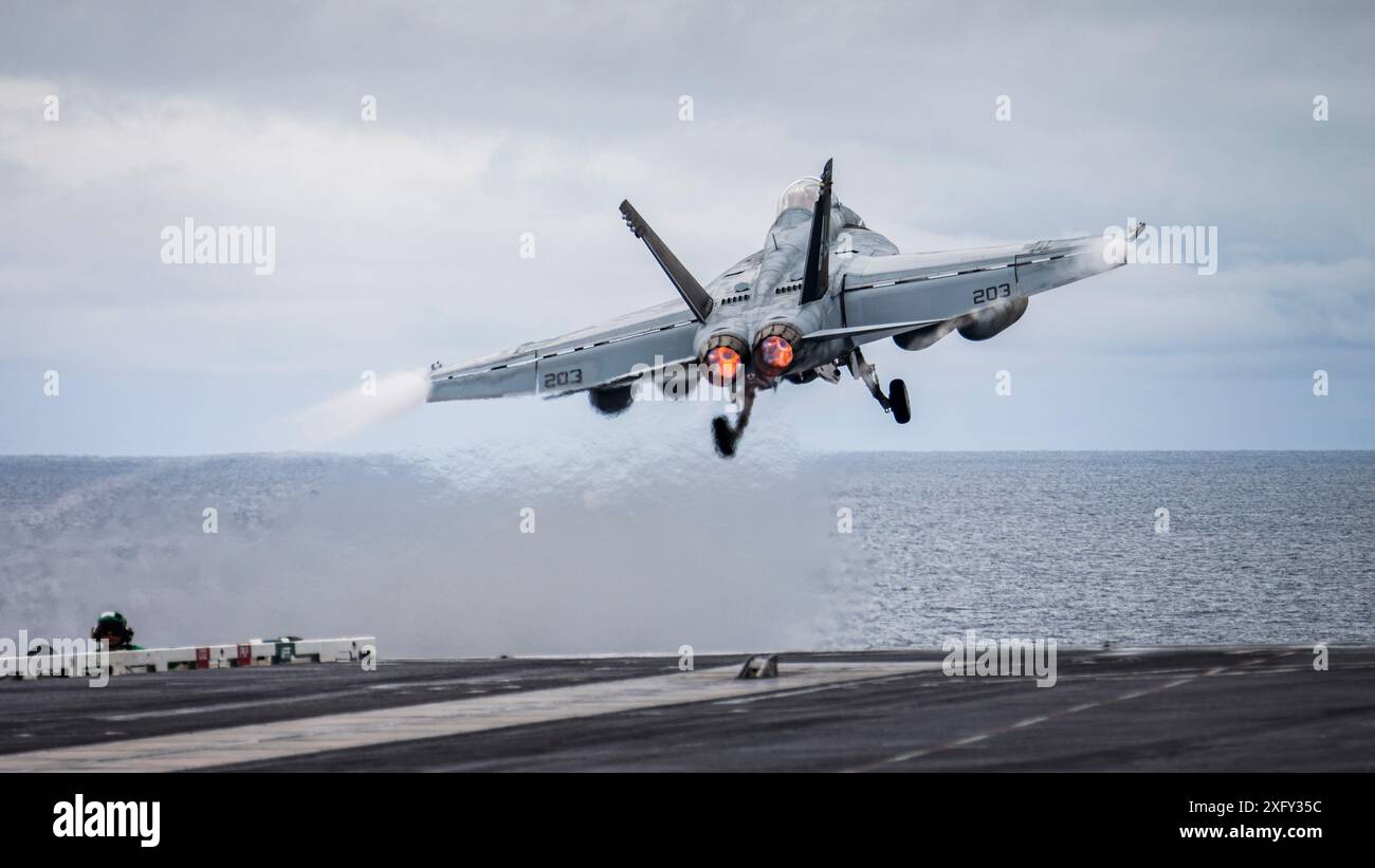 An F/A-18E Super Hornet, attached to Strike Fighter Squadron (VFA) 103 ...