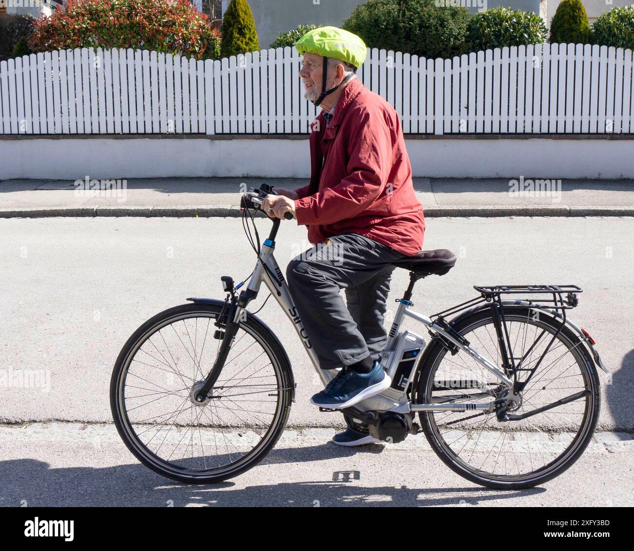 Cycling elderly e bike hi-res stock photography and images - Alamy