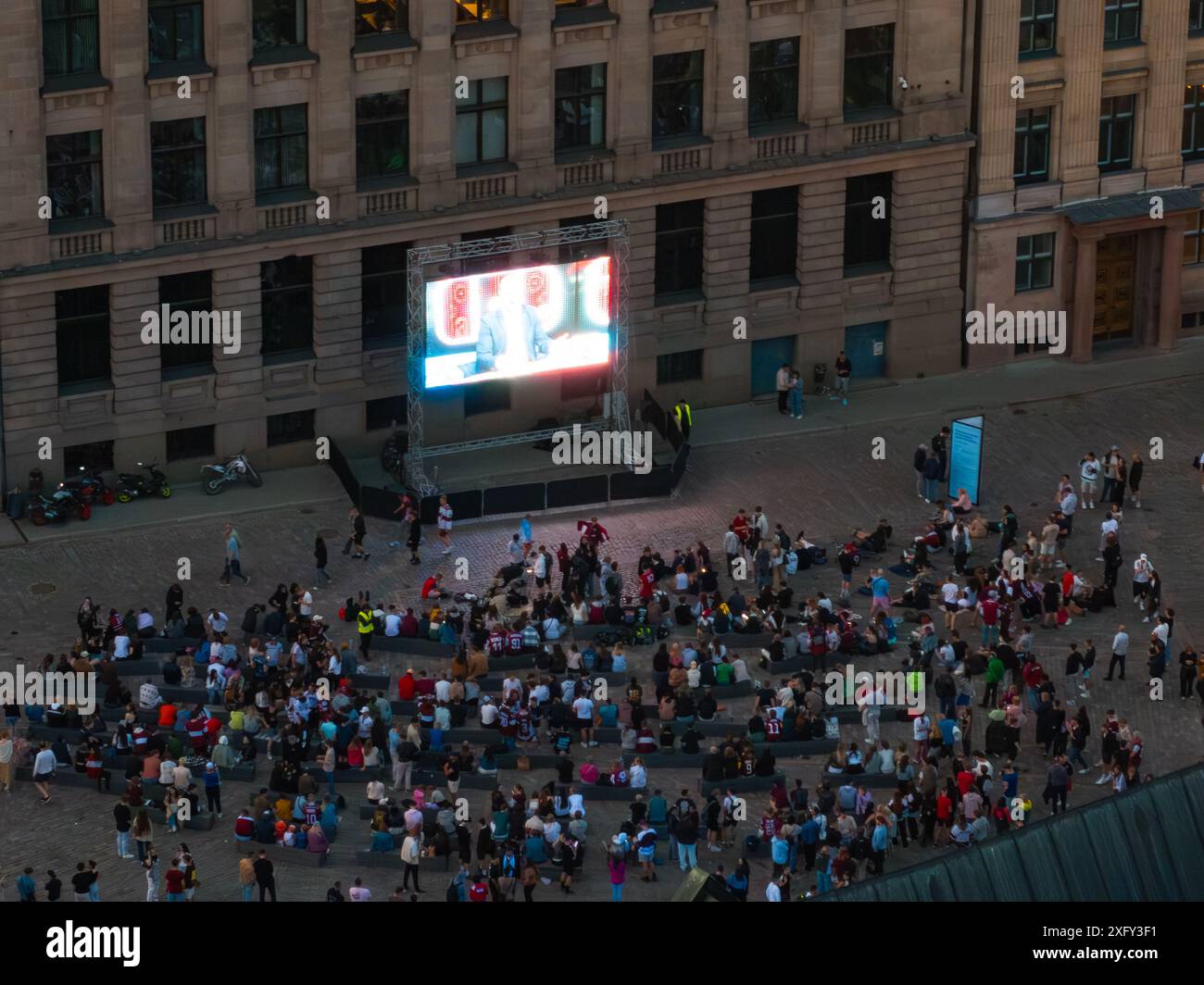 Aerial View of Crowd Watching Sporting Event on Large Screen in Riga ...