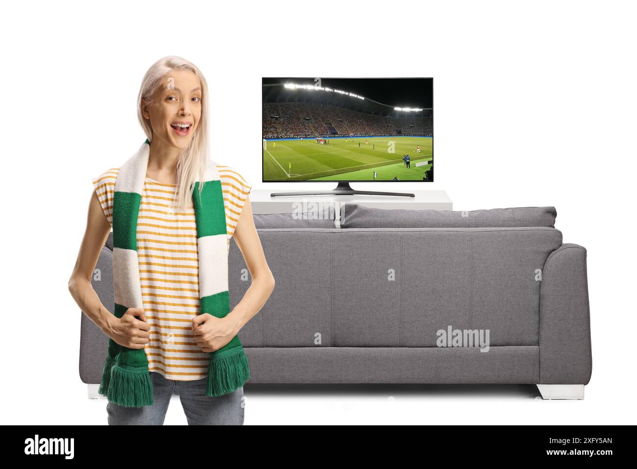 Happy young woman watching football on tv isolated on white background ...