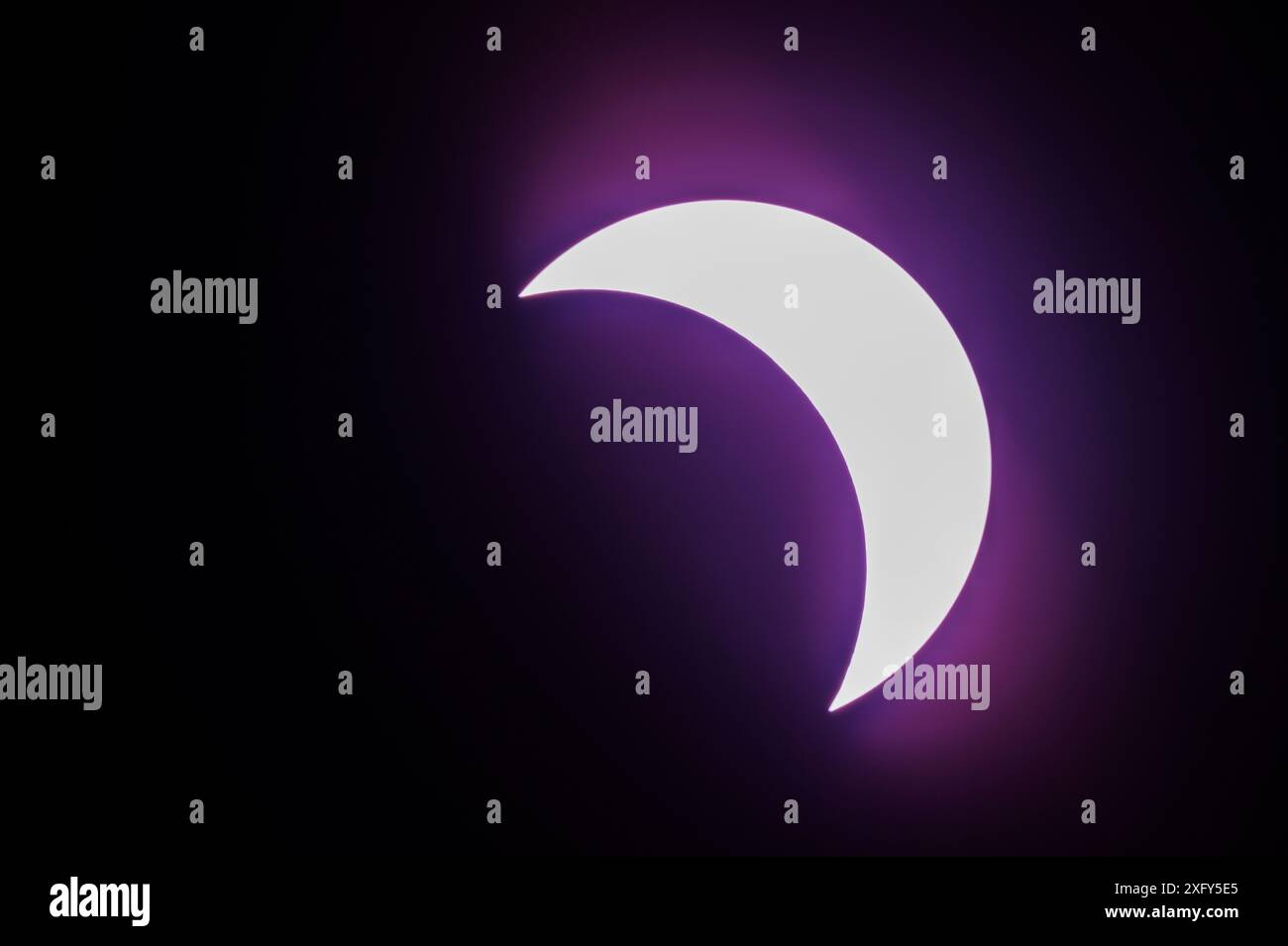 April 8; 2024; Photograph of the midday solar eclipse; the moon between ...