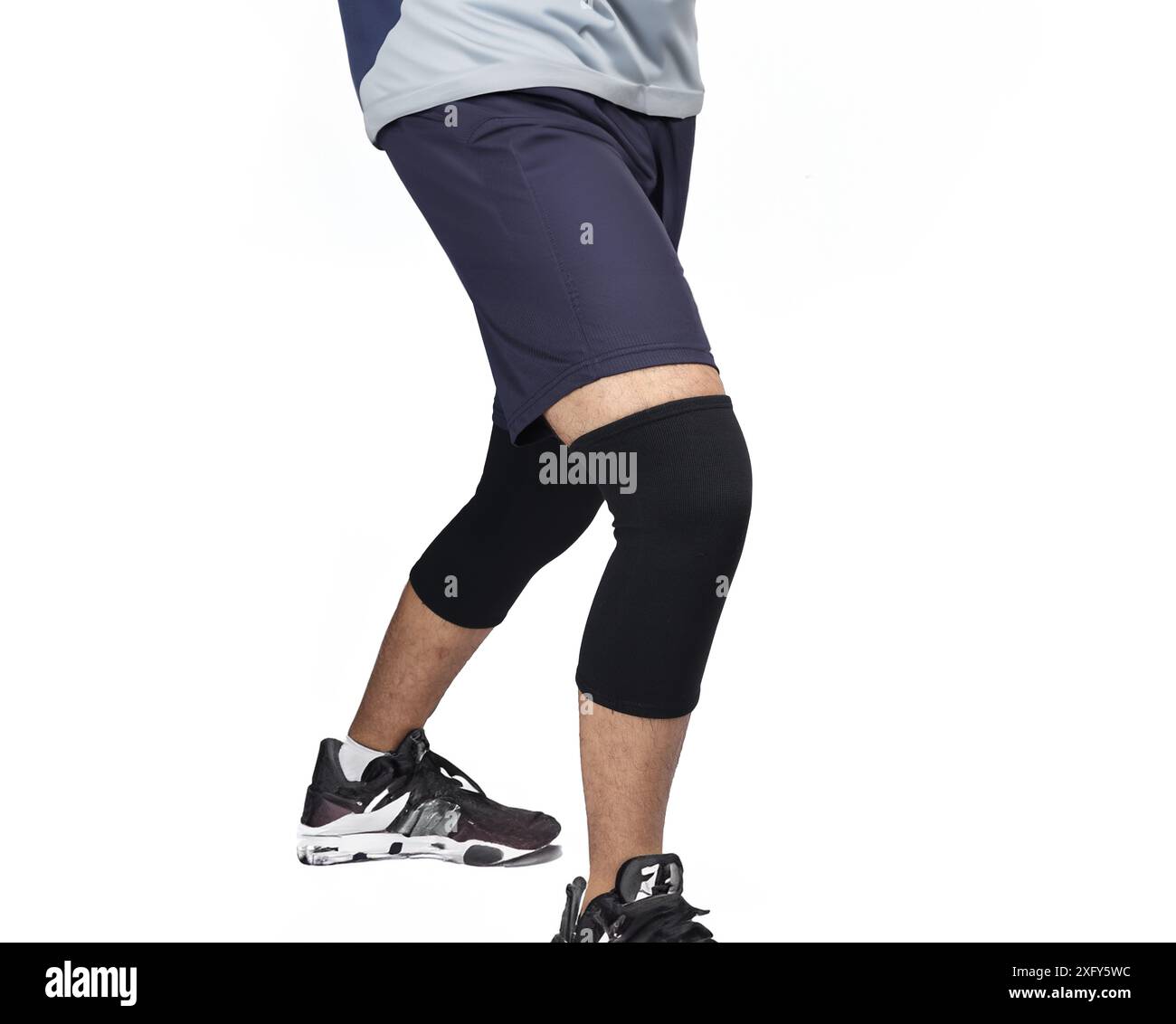 knee sleeve or knee cap shown on the models knee isolated on the white ...