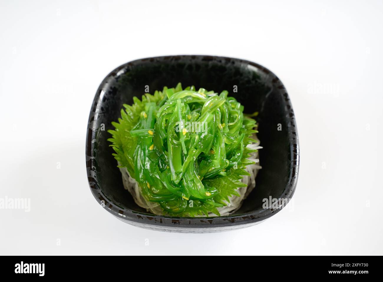 Traditional Japanese wakame salad with sesam seeds . Healthy and fresh ...