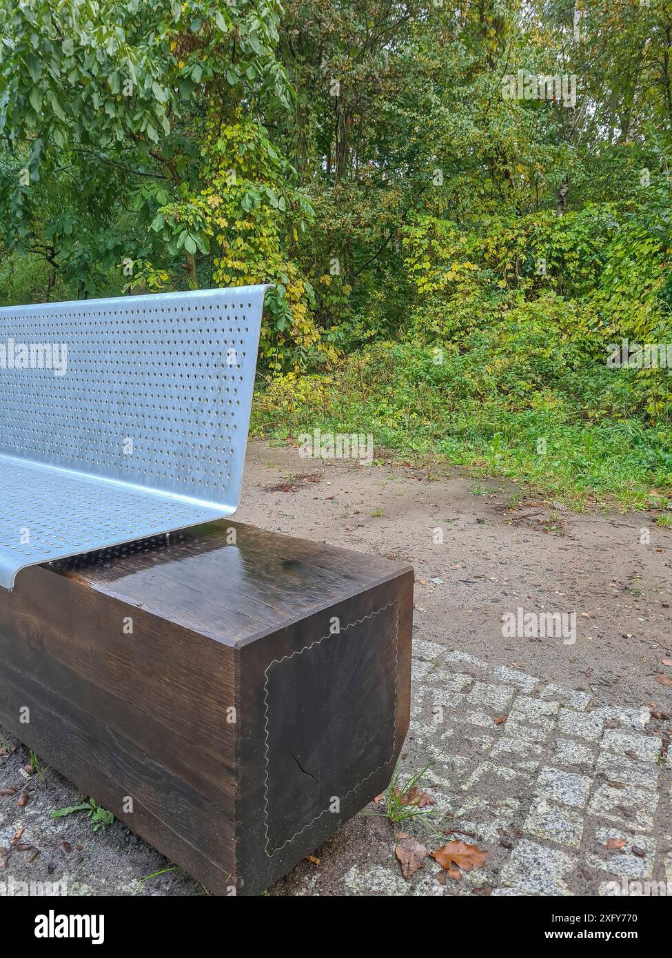 Bench made of wood metal in public green space hi-res stock photography ...
