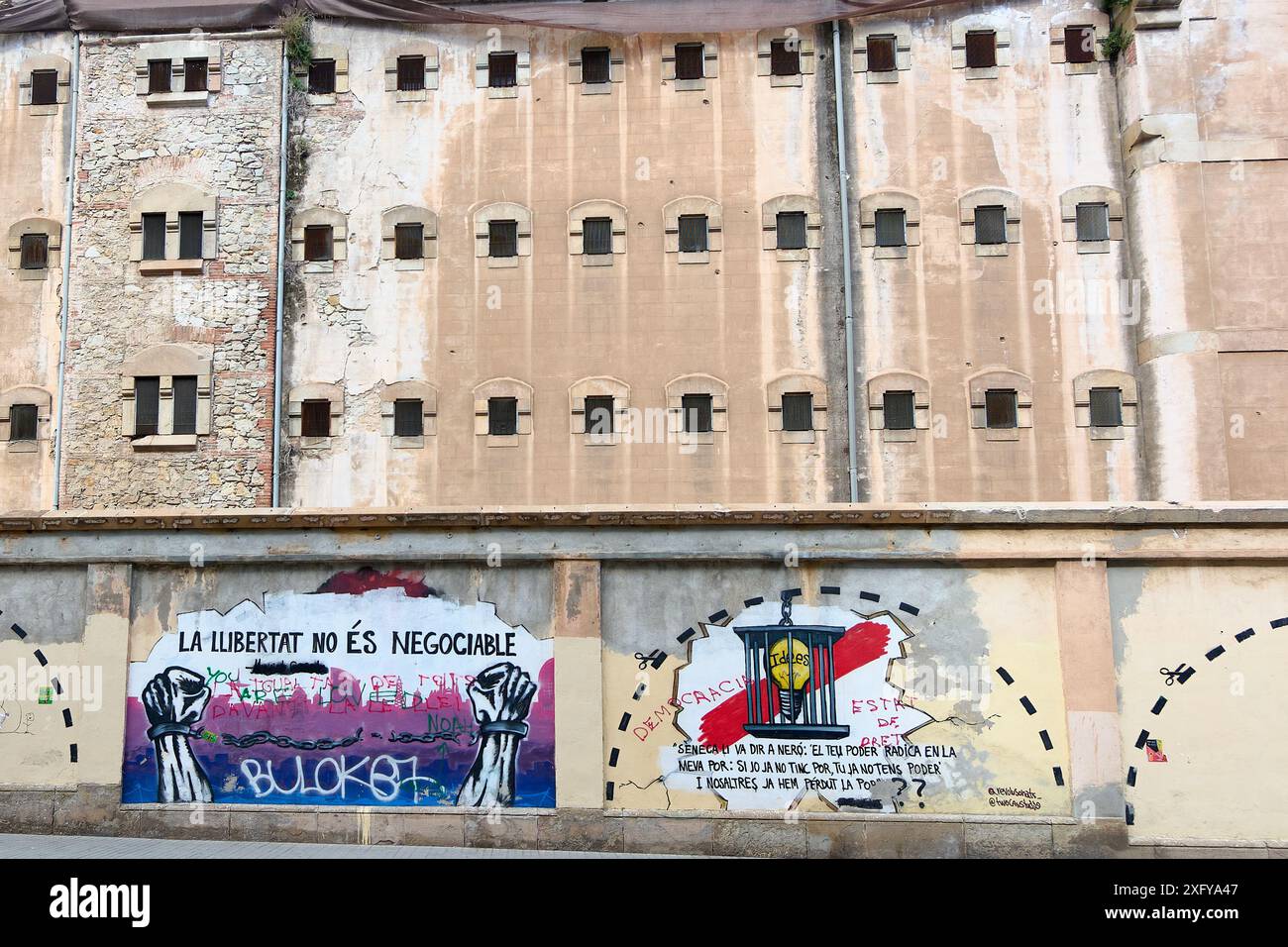 Barcelona, SPAIN - JULY 5, 2024: Weathered exterior of an iconic prison ...
