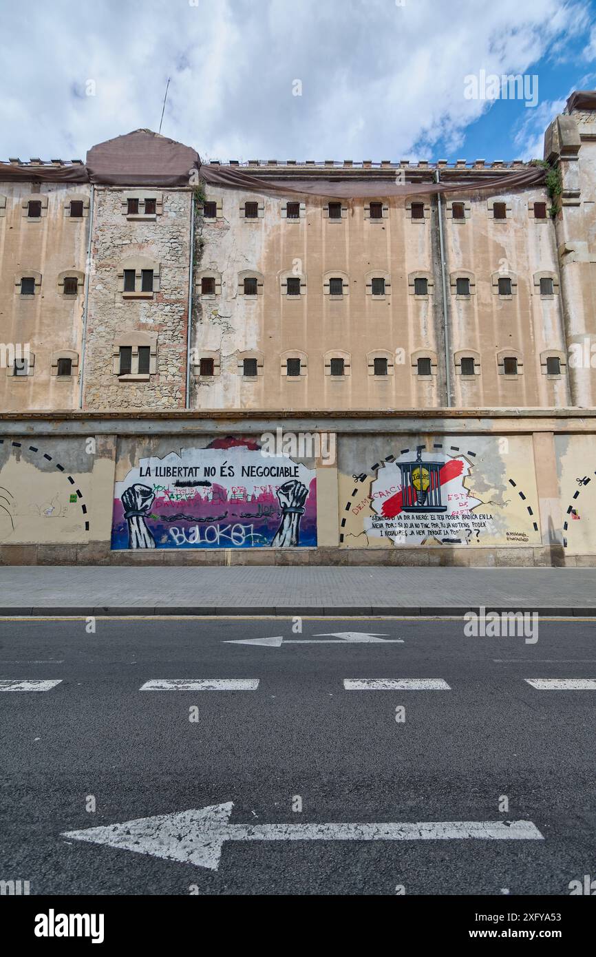 Barcelona, SPAIN - JULY 5, 2024: Aging facade of the historic Barcelona ...