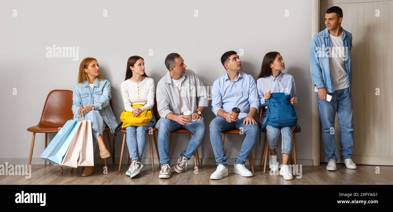 People waiting in hospital hall hi-res stock photography and images - Alamy