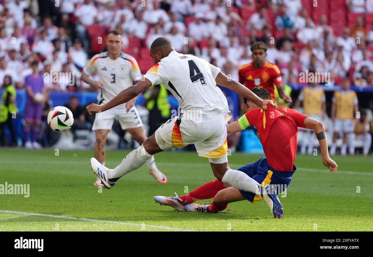 Spain’s Dani Olmo (right) scores their side's first goal of the game ...