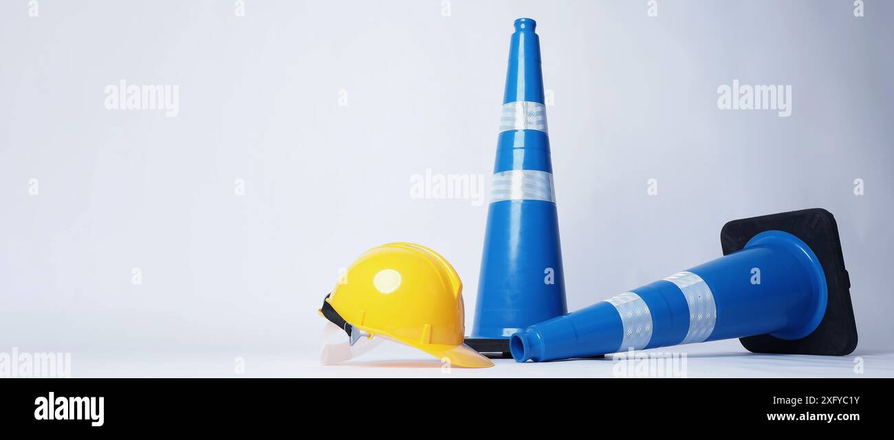 Road traffic safety equipment. Realistic blue traffic cones and yellow ...