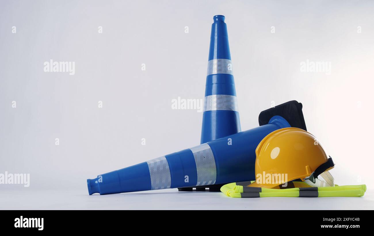 Road traffic safety equipment. Realistic blue traffic cones and yellow ...