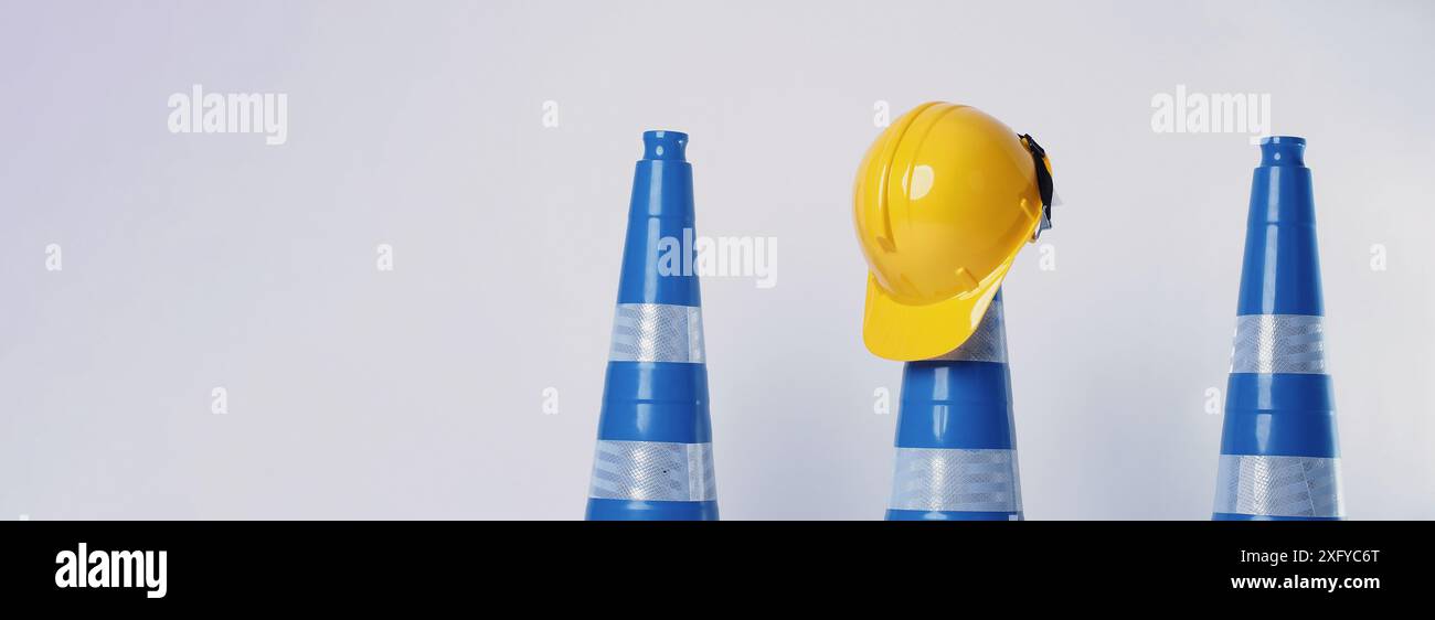 Road traffic safety equipment. Realistic blue traffic cones and yellow ...