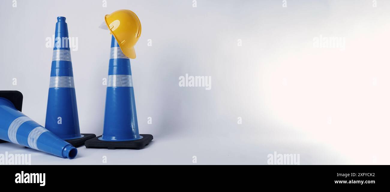 Road traffic safety equipment. Realistic blue traffic cones and yellow ...