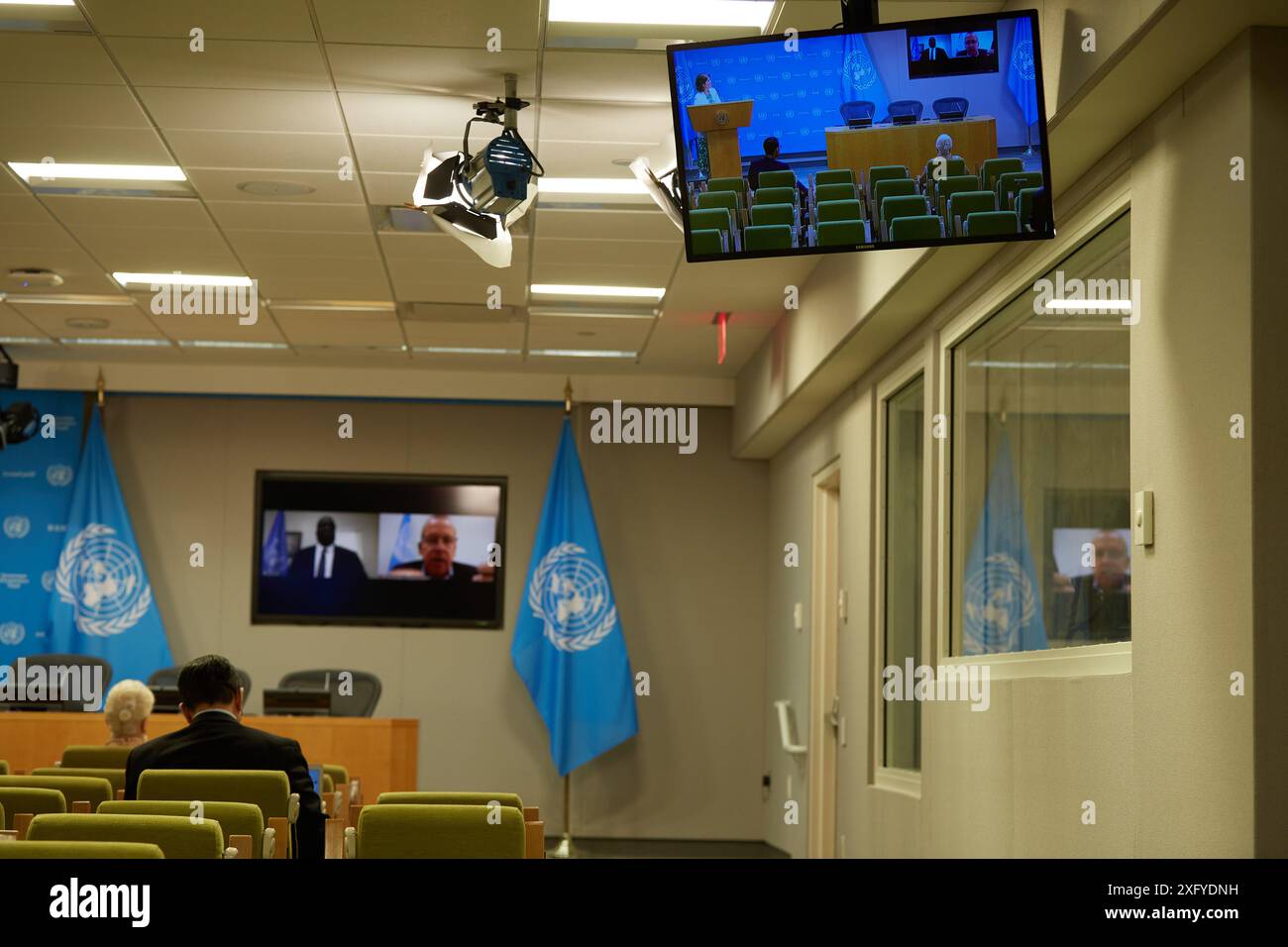 New York, New York, USA. 5th July, 2024. Mr. Dennis Zulu (L), Resident ...