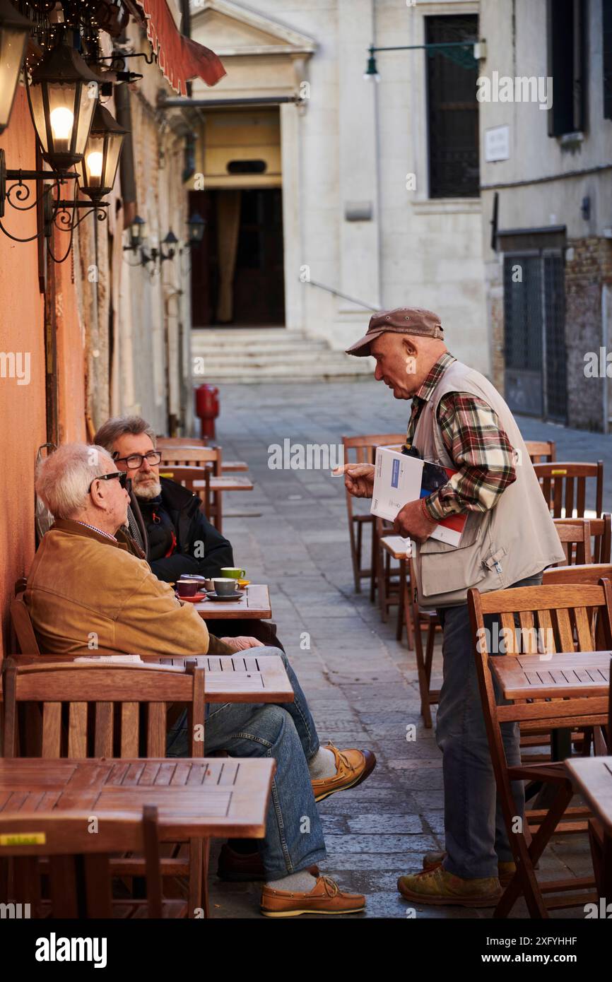 Men in street cafe hi-res stock photography and images - Alamy