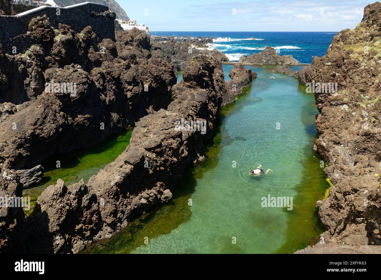 Coastal landscape with sea swimming pool of Porto Moniz, Ilha de Madeira, Atlantic Ocean ...
