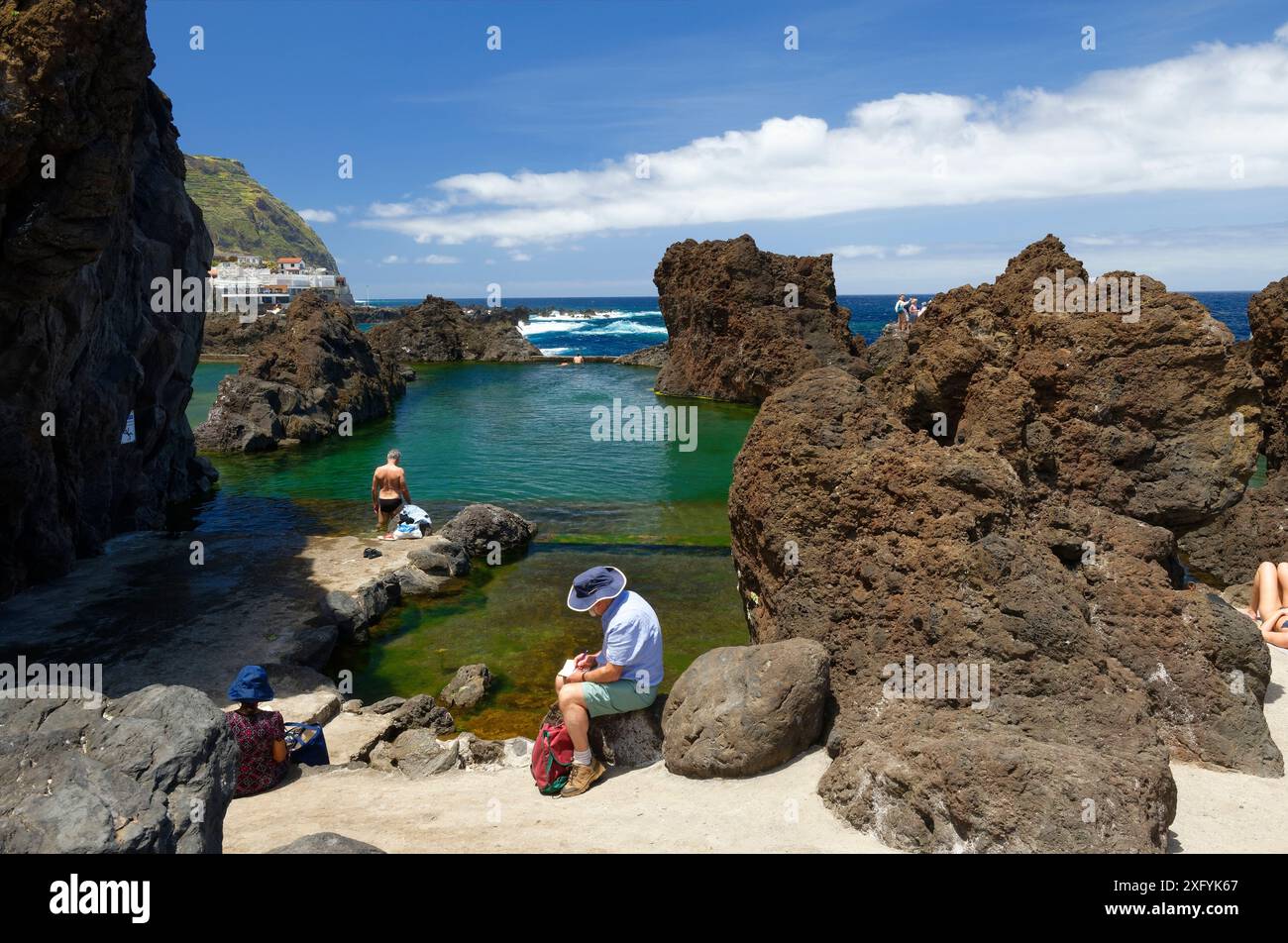 Coastal landscape with sea swimming pool of Porto Moniz, Ilha de Madeira, Atlantic Ocean ...