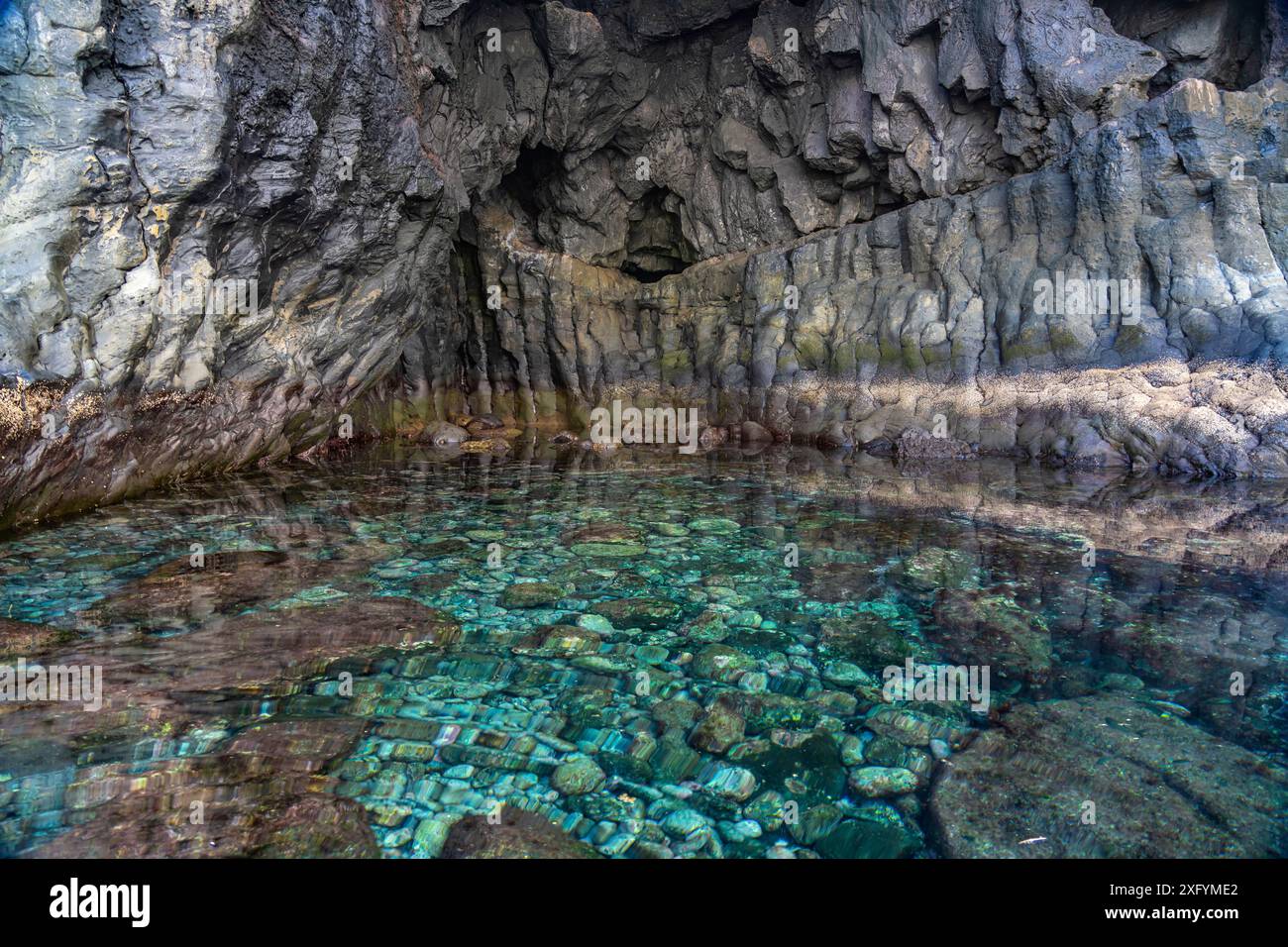 Basalt rocks at the de la laja natural swimming pool hi-res stock ...