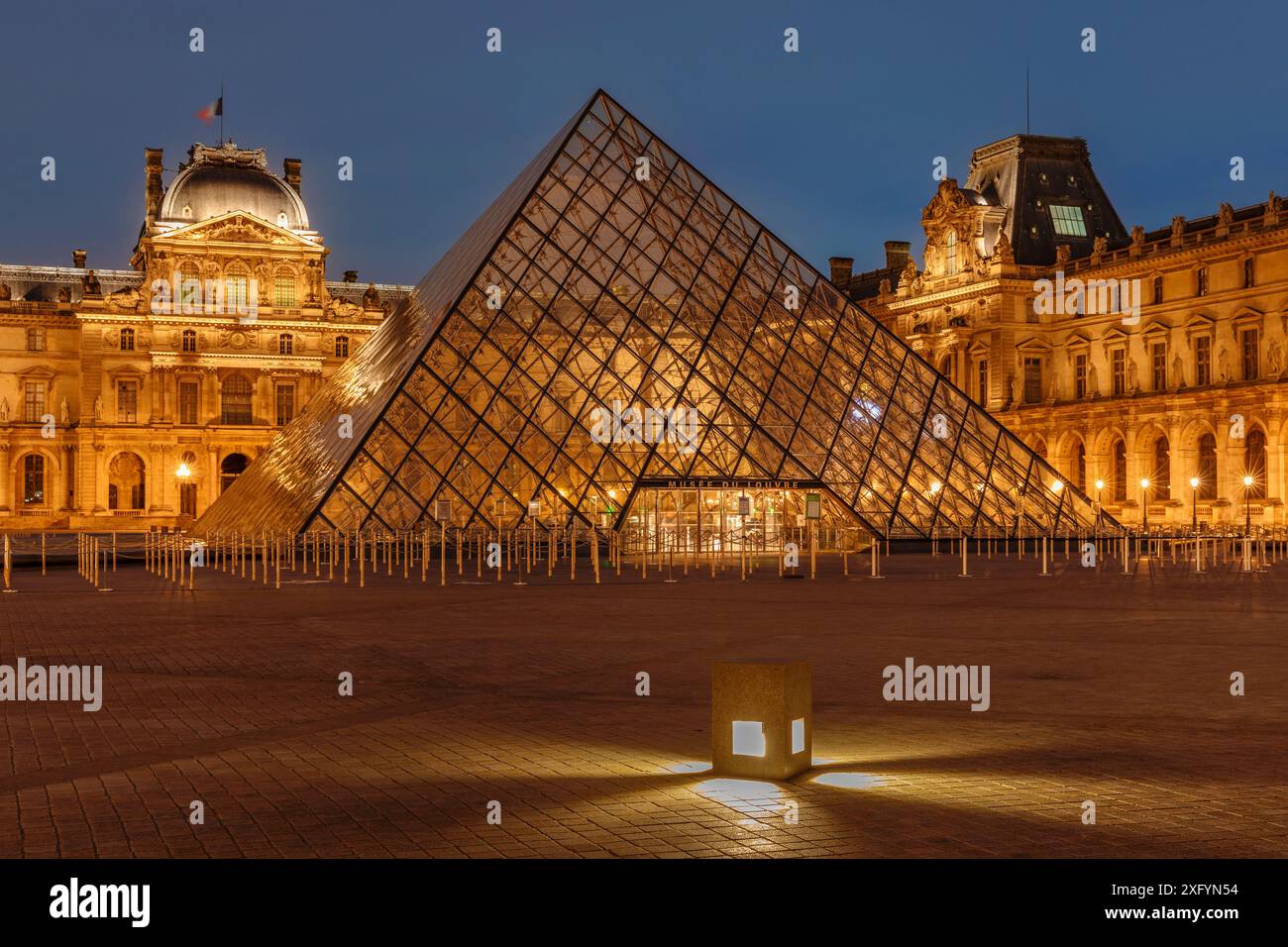 Paris museum glass pyramid hi-res stock photography and images - Alamy