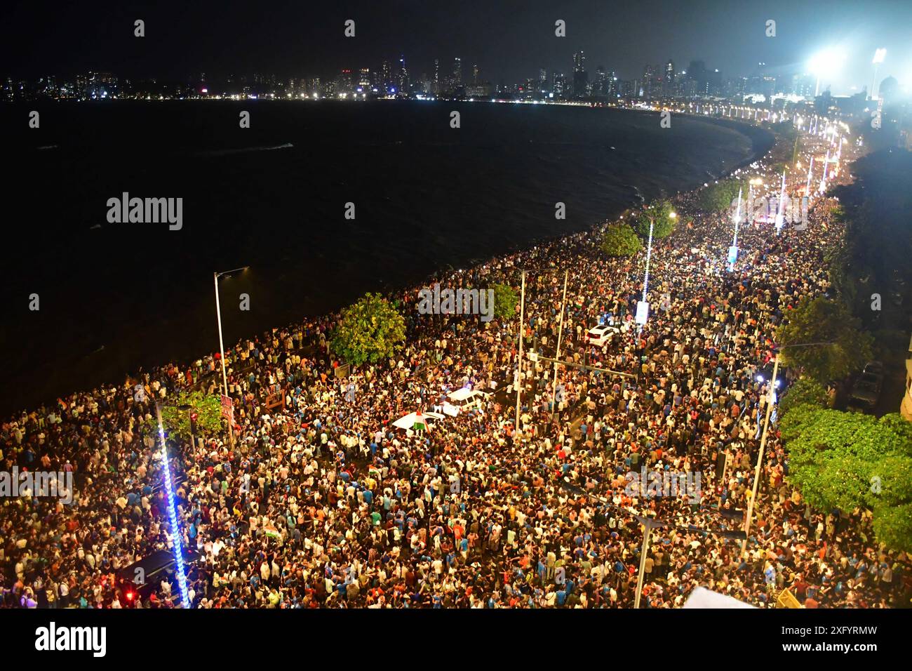 MUMBAI, INDIA - JULY 4: Indian cricketers gesture during an open bus ...