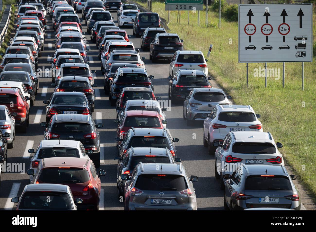 Zagreb, Croatia. 05th July, 2024. Cars form a queue at a toll station ...