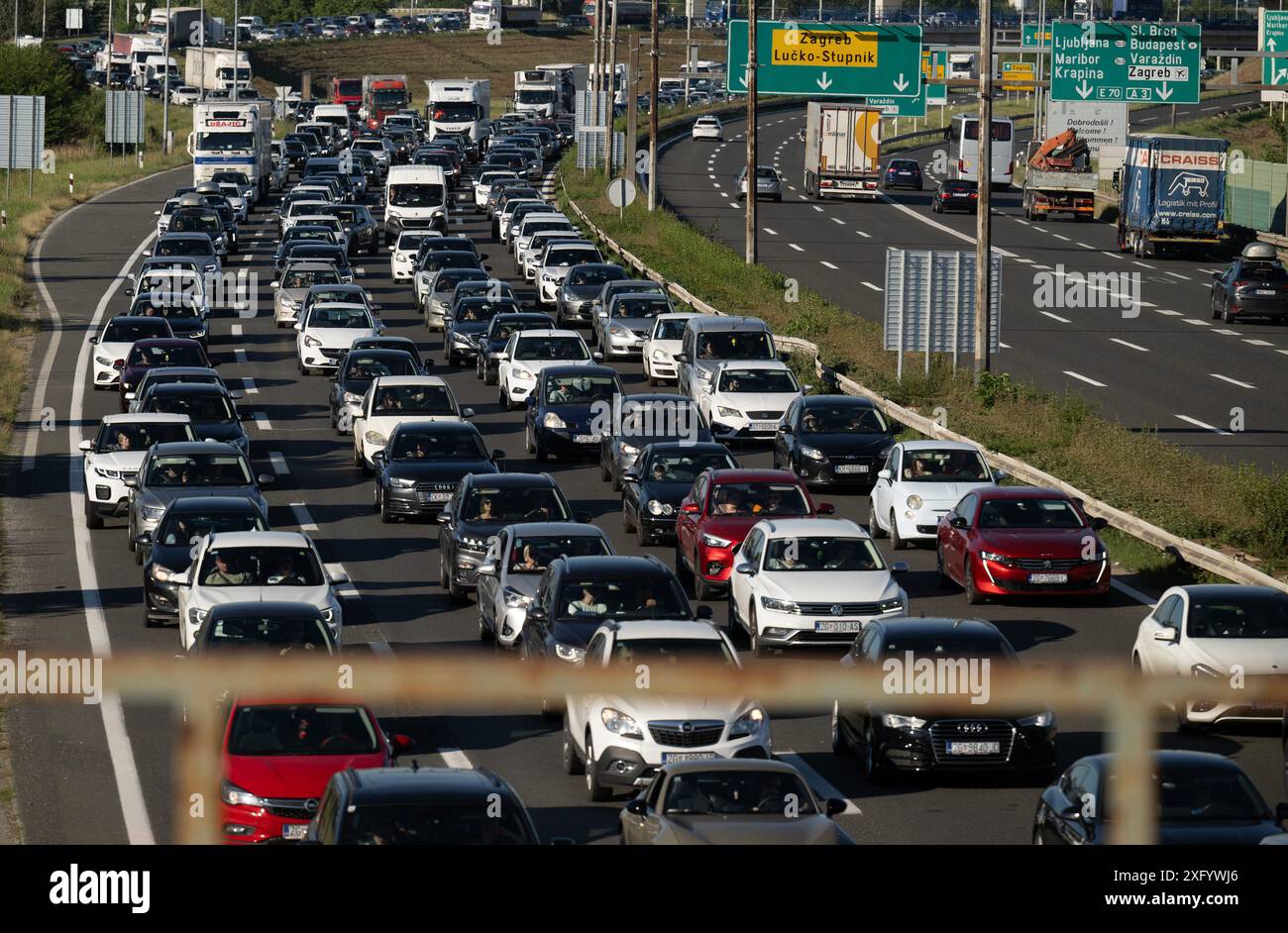 Zagreb, Croatia. 05th July, 2024. Cars form a queue at a toll station ...