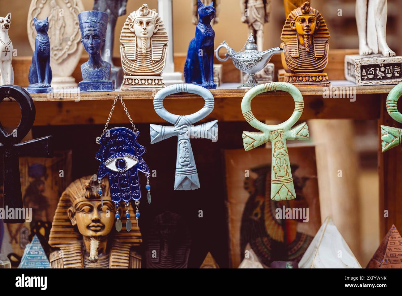 A collection of various souvenirs including pharaohs figurines, ankhs ...