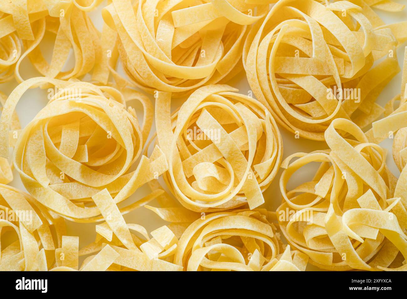 Italian pasta tagliatelle close-up. Food background Stock Photo - Alamy