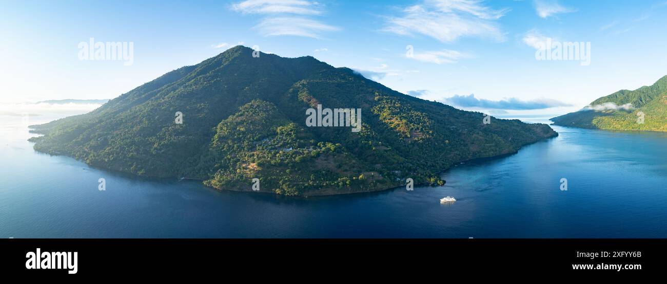 Pulau Pura, a scenic volcano, sits in the middle of the Pantar Strait ...