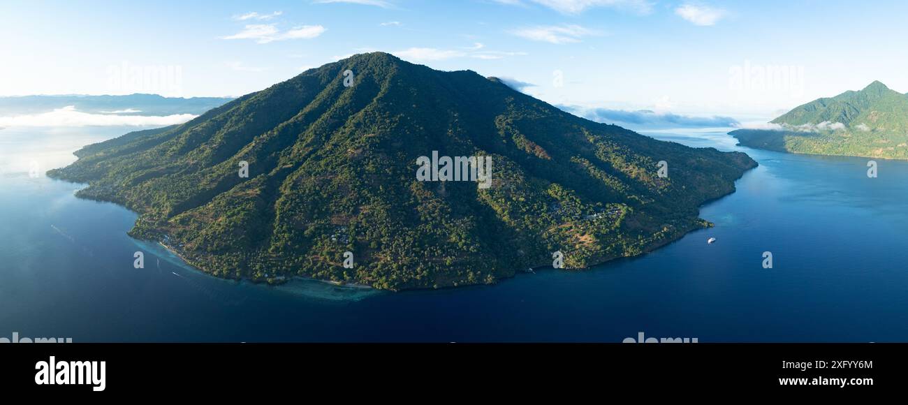 Pulau Pura, a scenic volcano, sits in the middle of the Pantar Strait ...