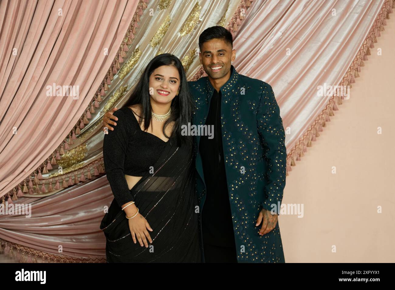 Indian cricketer Suryakumar Yadav with wife Devisha Shetty pose for a picture during pre-wedding ...