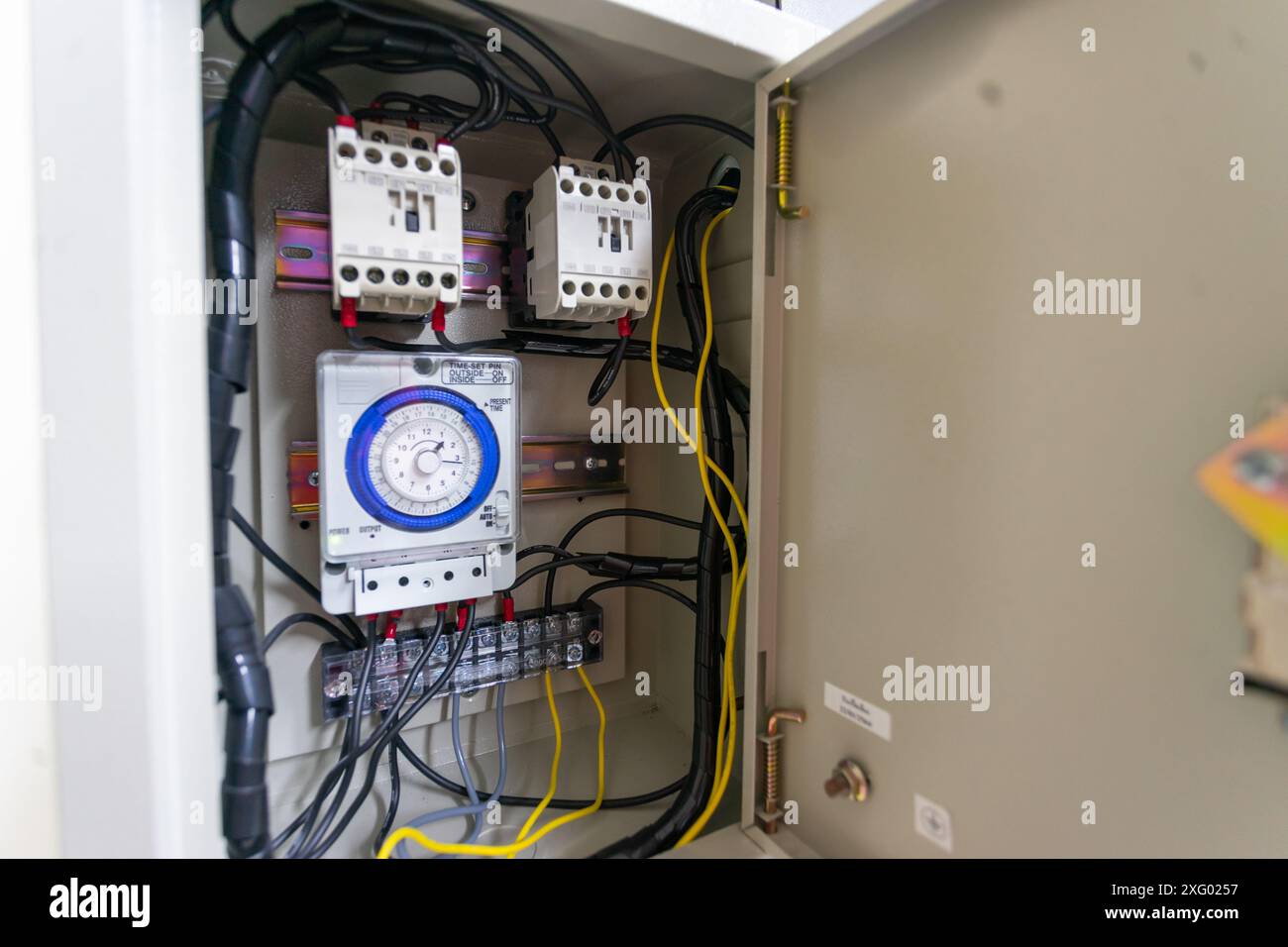 Electrical cabinet timer used to power large electrical equipment Stock ...