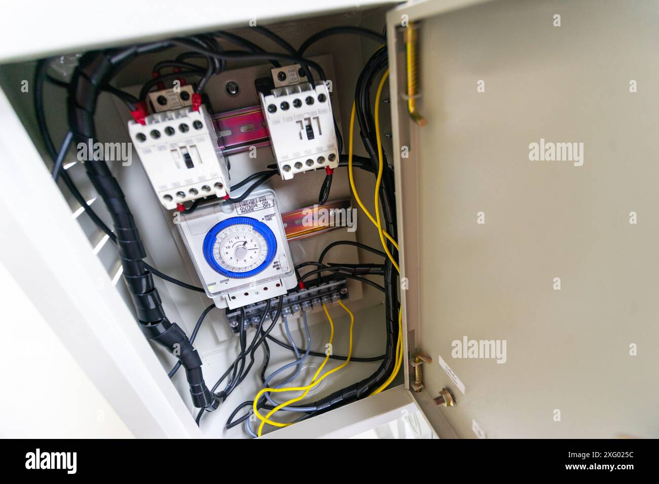 Electrical cabinet timer used to power large electrical equipment Stock ...